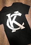 Rally Kansas City Monogram Black Short Sleeve T Shirt